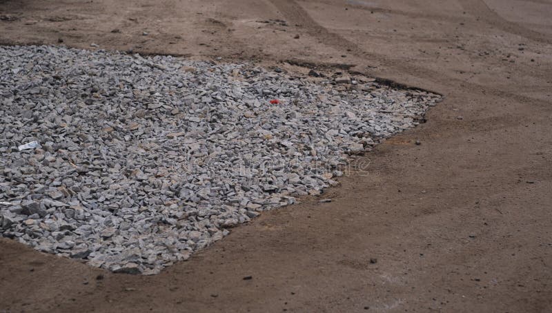 Large Pit in Asphalt Road Covered with Rubble. Concept of Problem Roads ...