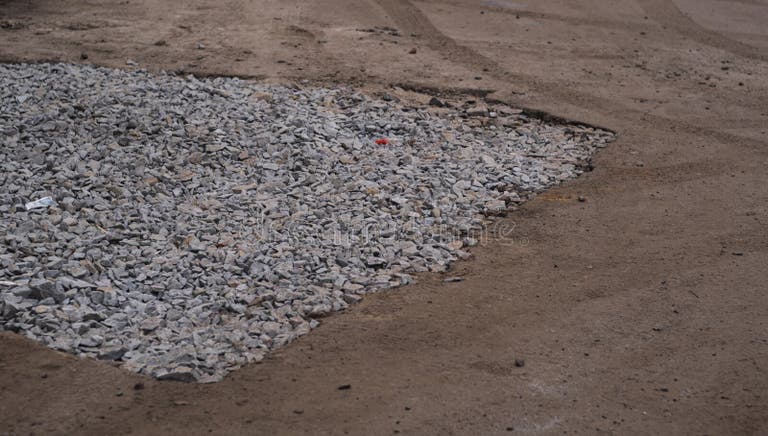 Large Pit in Asphalt Road Covered with Rubble. Concept of Problem Roads ...