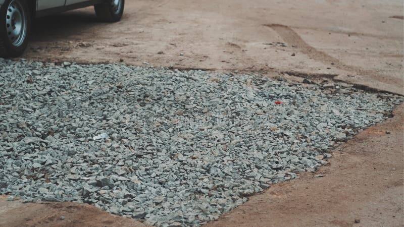 Large Pit in Asphalt Road Covered with Rubble. Concept of Problem Roads ...