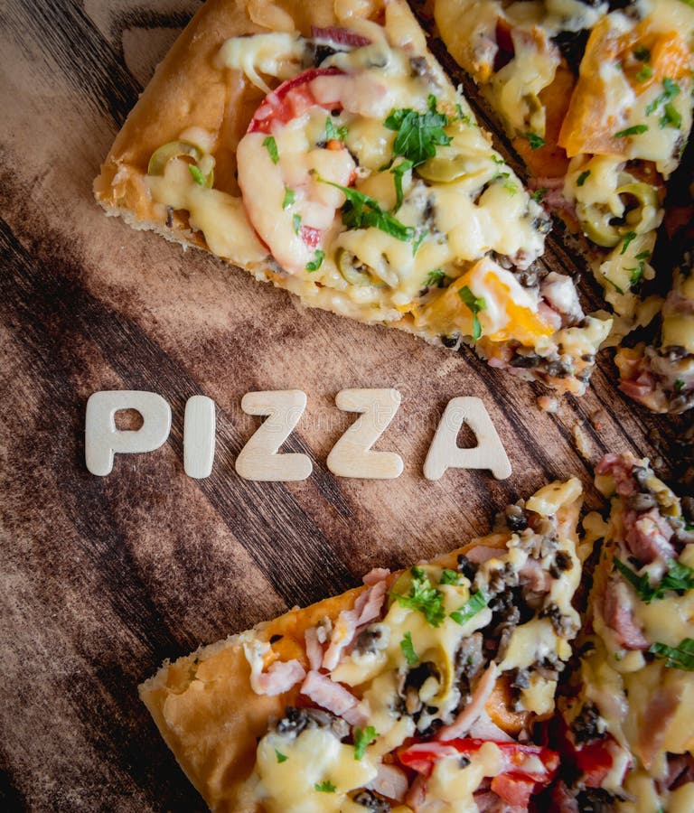 Large Pizza on a Wooden Table. Restaurant. Stock Photo - Image of ...