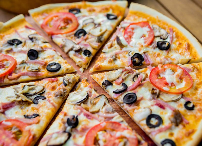 Large Pizza on a Wooden Table. Restaurant. Stock Photo - Image of ...