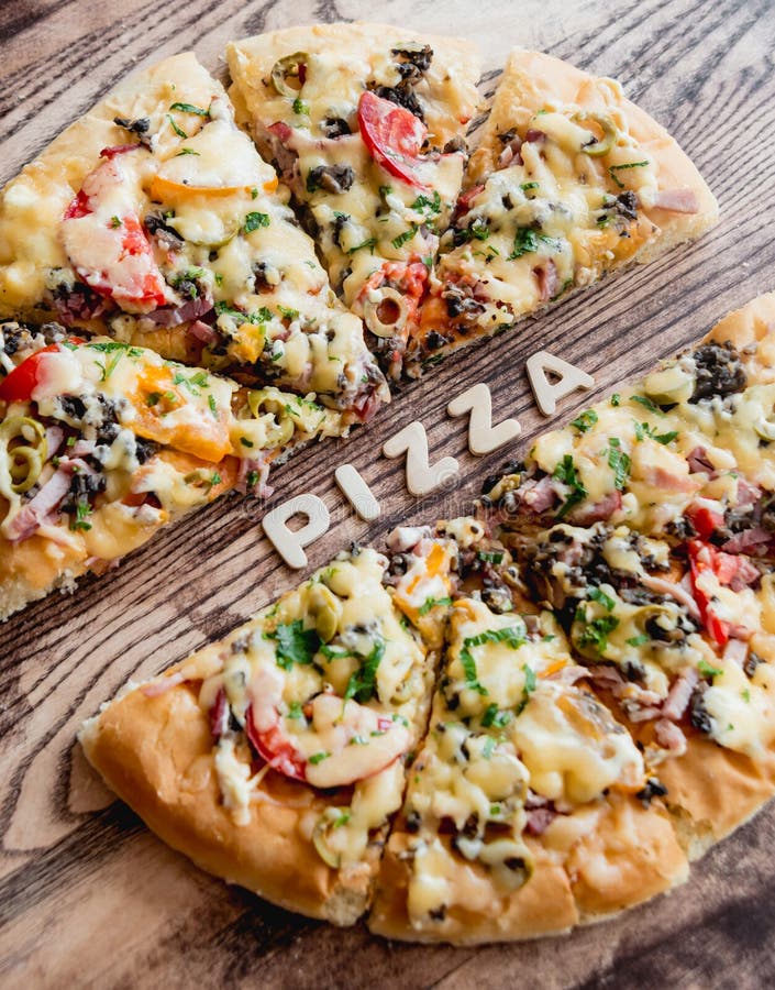 Large Pizza on a Wooden Table. Restaurant. Stock Photo - Image of ...