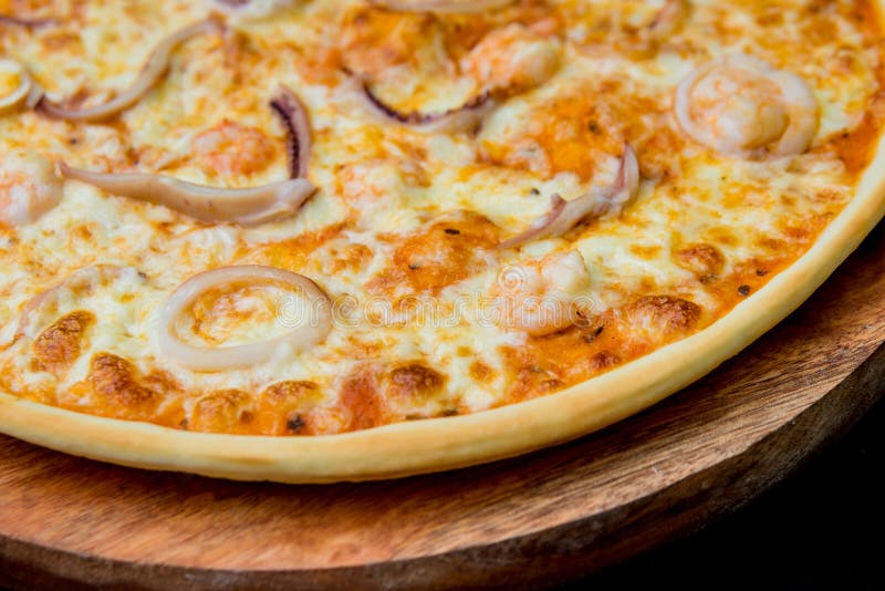 Large Pizza on a Wooden Table. Restaurant. Stock Photo - Image of ...