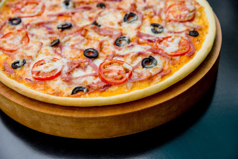 Large Pizza on a Wooden Table. Restaurant. Stock Photo - Image of ...