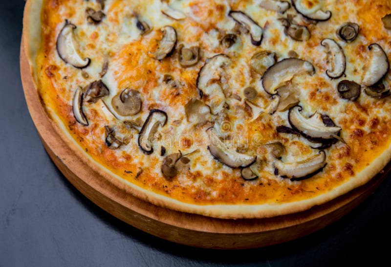 Large Pizza on a Wooden Table. Restaurant. Stock Image - Image of ...