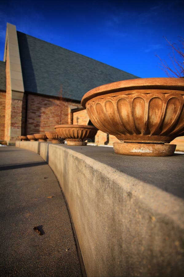 Large Planters Circling a Church Stock Photo - Image of pavement, patio ...