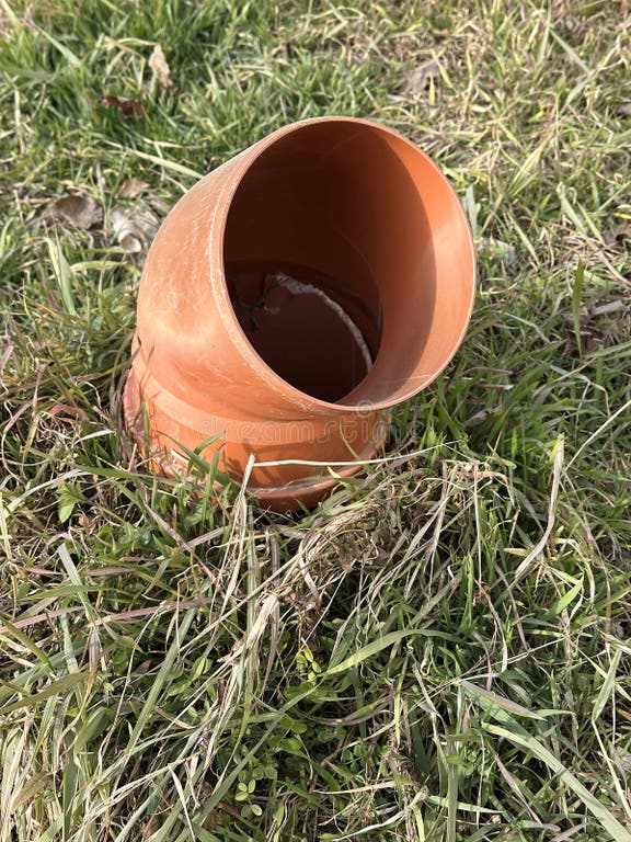 Large Plastic Pipe in the Grass Field Stock Photo - Image of field ...