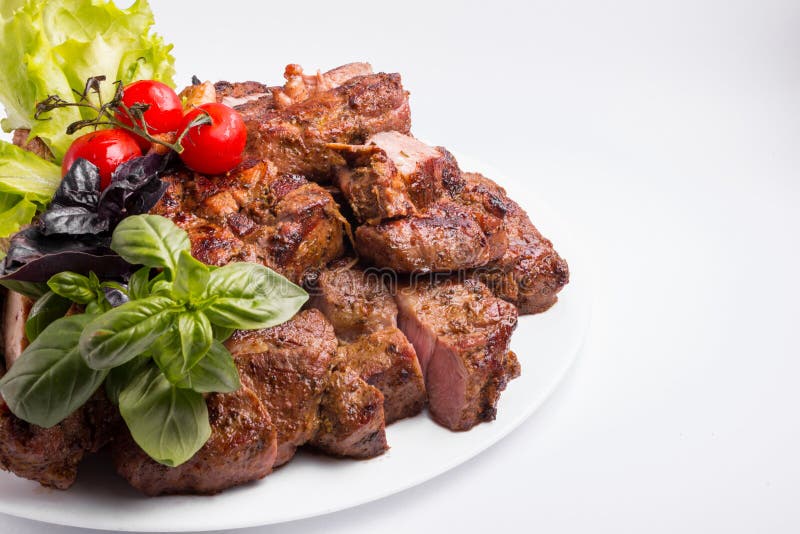 A Large Plate of Meat Assorted Cooked on a Grill Stock Image - Image of ...