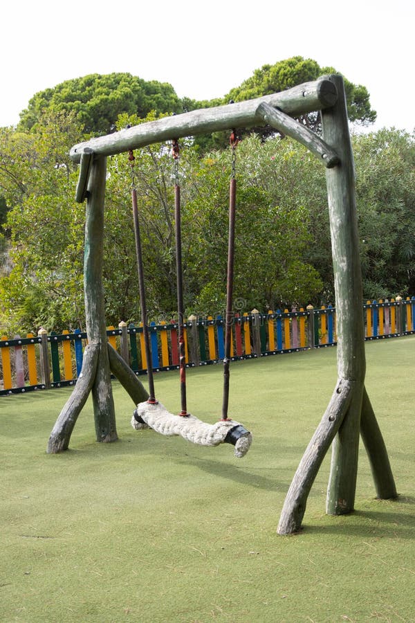 Large Playground Swings Made from Solid Tree Trunks Stock Image - Image ...