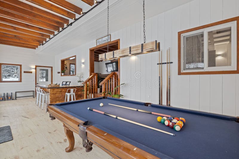 Large Pool Table in a Room with Wooden Elements Stock Photo - Image of ...