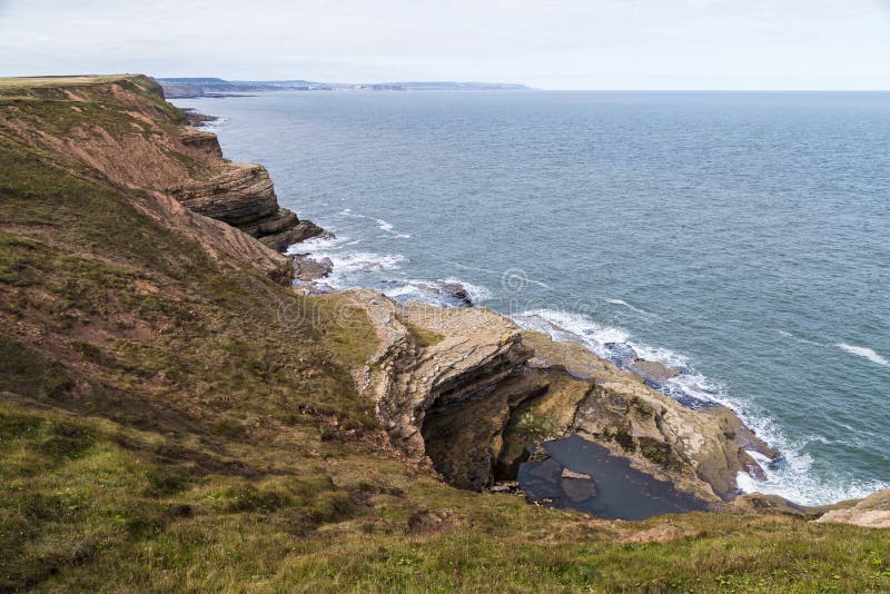 Cliffs at Filey bay stock image. Image of shot, coast - 124438981