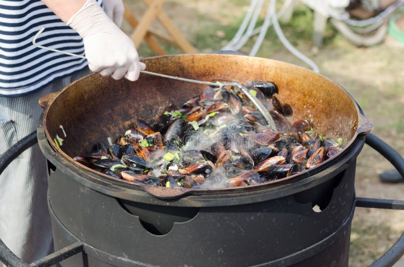 Large Pot of Hot Steaming Mussels Cooking Outdoors Stock Image - Image ...