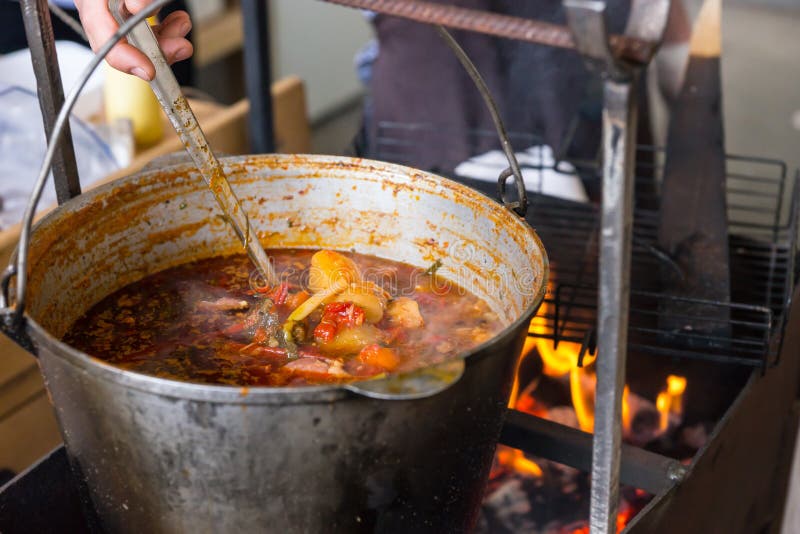 Large Pot of Stew Simmering Over a Fire Stock Photo - Image of charcoal ...