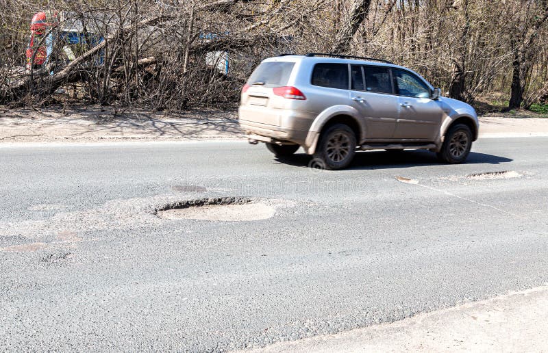 Large Pothole an Example of Poor Road Maintenance Stock Photo - Image ...