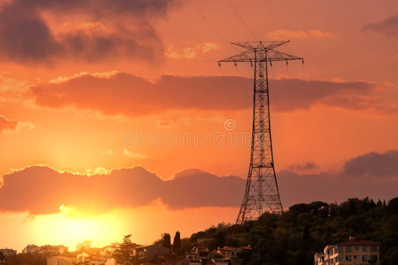 A Large Power Line Support on a Mountain Against a Background of a ...