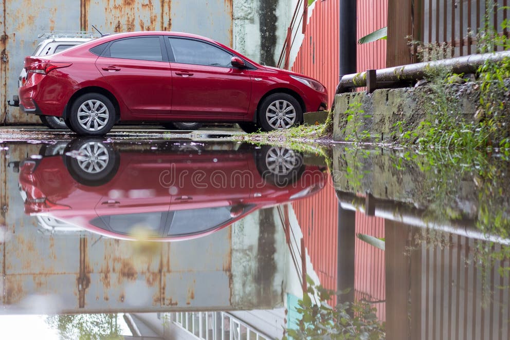 A Large Puddle in the Courtyard after the Rain Editorial Photo - Image ...
