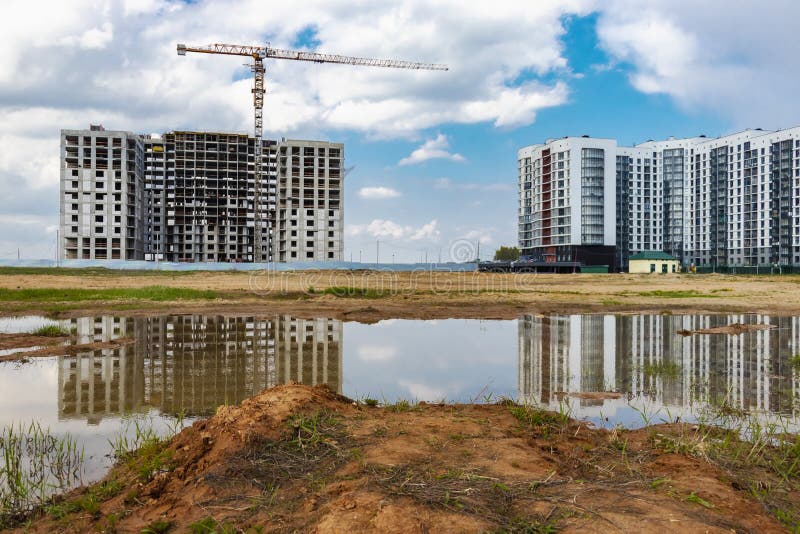 A Large Puddle after Rain at the Construction Site of a Large ...