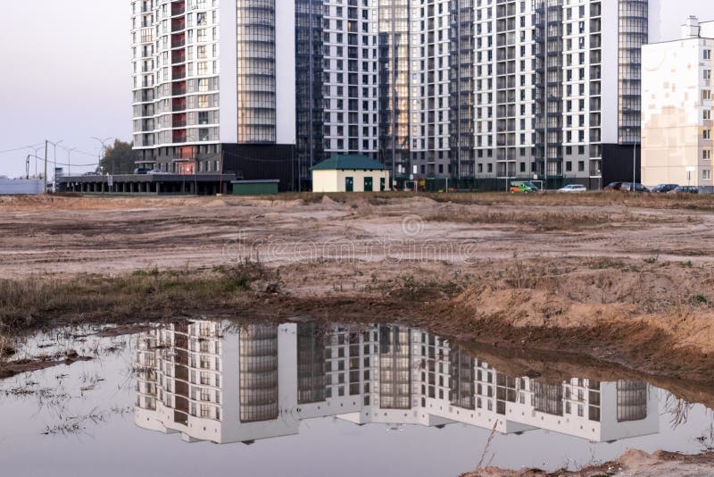 A Large Puddle after Rain at the Construction Site of a Large ...