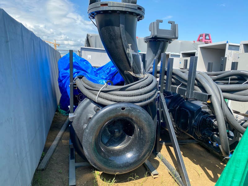 A Large Pump with an Impeller and an Impeller Stands in a Storage ...