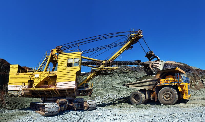 Large Quarry Dump Truck. Loading the Rock in the Dumper Stock Image ...