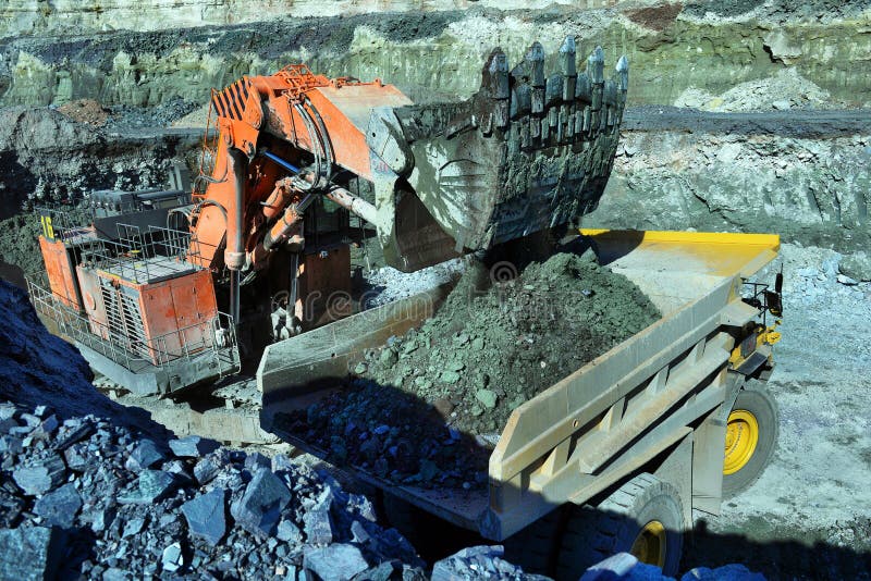 Large Quarry Dump Truck. Loading the Rock in the Dumper Stock Image ...