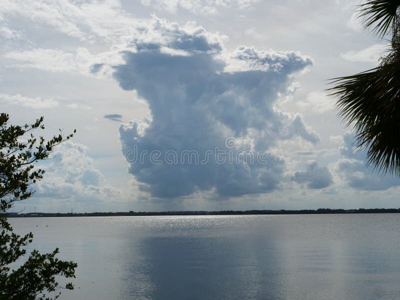 A Large Rain Cloud Over a Lake in Florida Stock Image - Image of ...