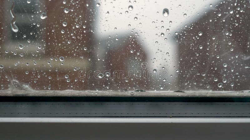 Large Rain Drops Strike Open Window Pane during Heavy Shower in England ...