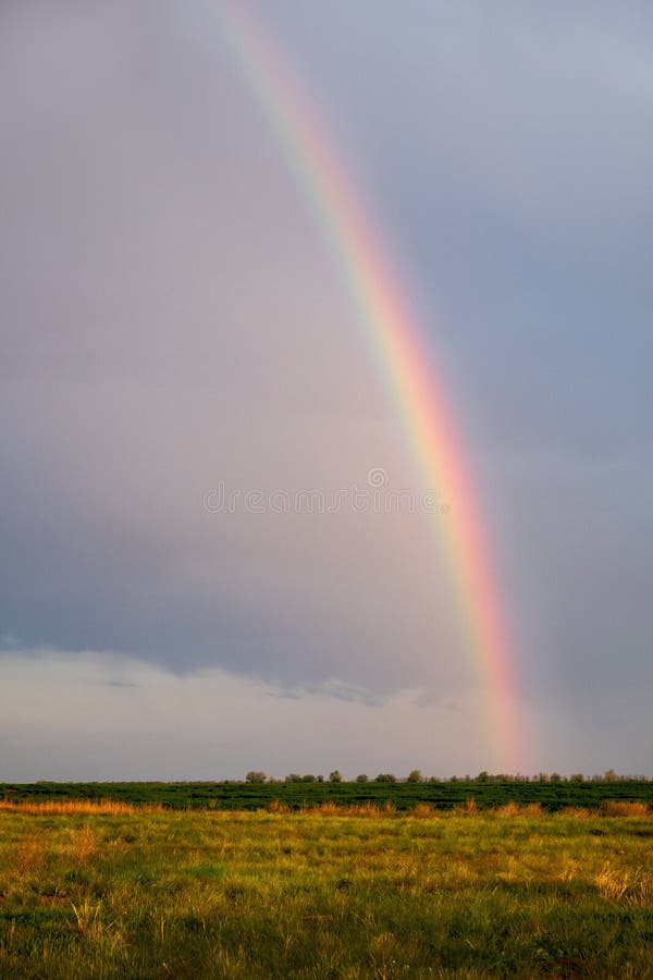 Big Rainbow on the Backdrop of a Rainy Sky Stock Image - Image of ...