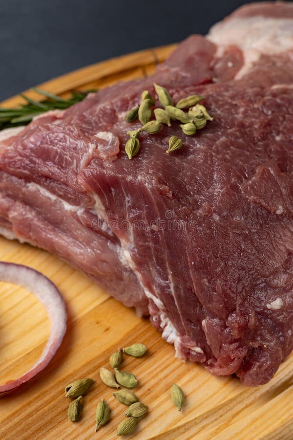Large Raw Piece of Meat on a Black Background Stock Image - Image of ...