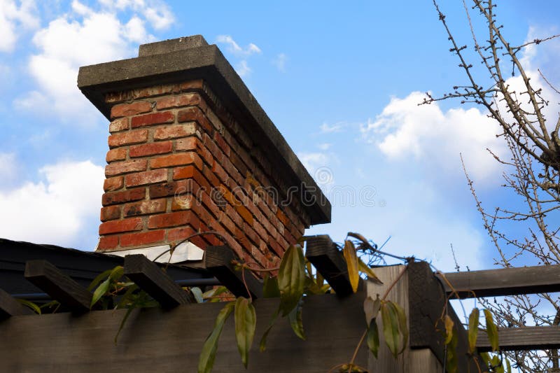 Large Reb Brick Chimney stock image. Image of house - 272143289