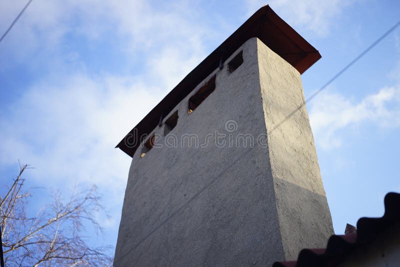 Large Rectangular Chimney on the Roof, Close View from Below, Blue Sky ...