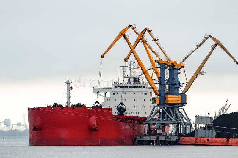 Large red cargo ship stock image. Image of black, industry - 88470331