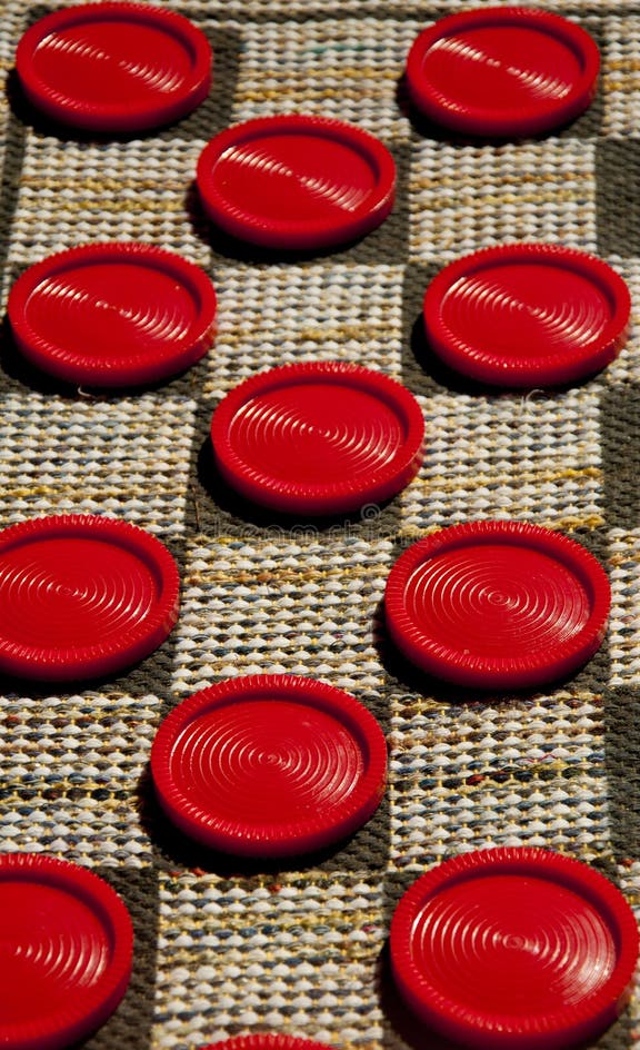 Large Red Checkers on a Cloth Board. Stock Image - Image of boards ...