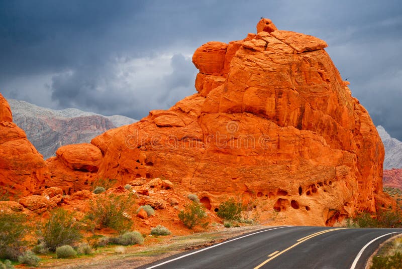 Large Red Cliff and Two Ravens Stock Photo - Image of travel, fire ...