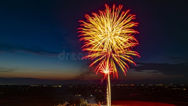 Large Red and Gold Fireworks Exploding in the Night Sky, Creating ...