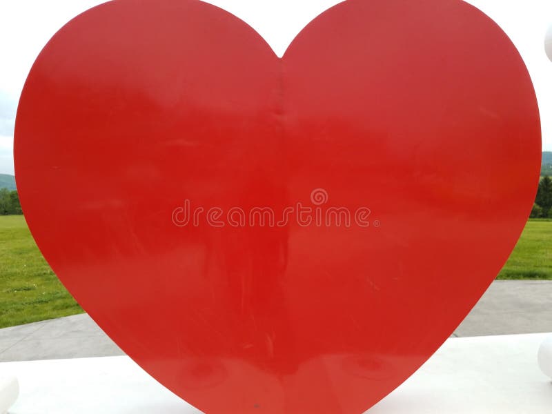 Large Red Heart Shape on White Platform Outdoor Stock Photo - Image of ...