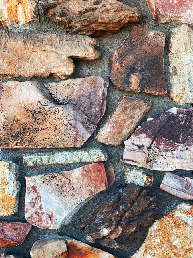 Large Red and Natural Colors Rock Stone Building Wall Stock Image ...