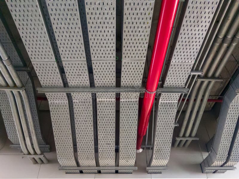 The Large Red Pipe of the Fire Protection System is Hanging on the ...