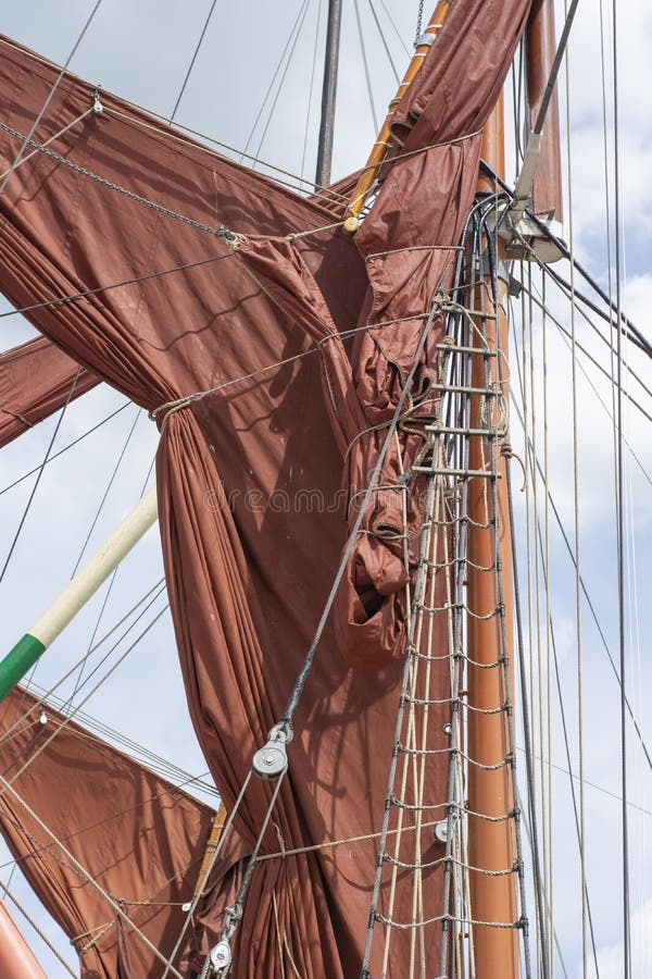 Large Red Sail on a Sailboat Stock Photo - Image of floats, float ...