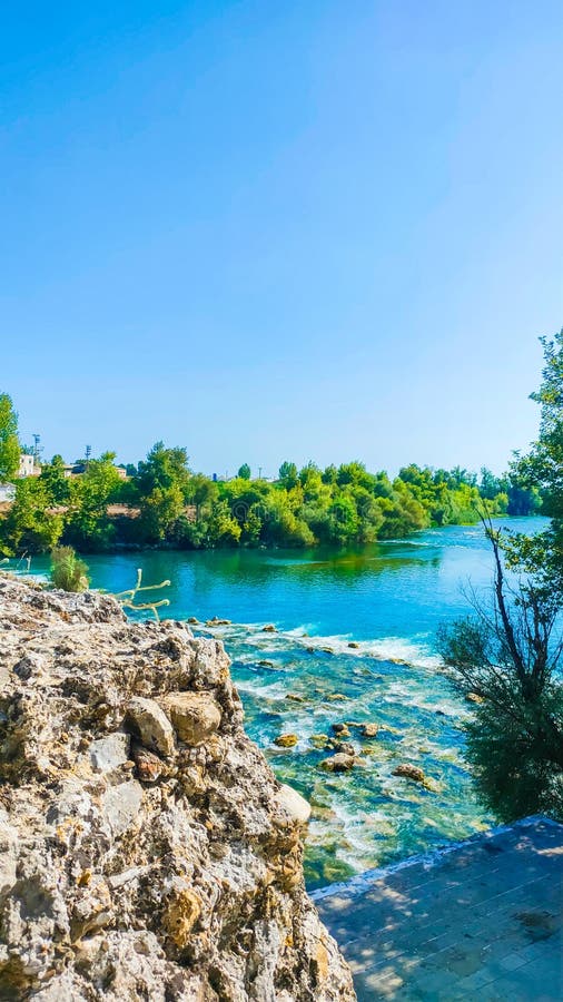 A Large River Whose Water Flows Calmly Stock Photo - Image of flows ...