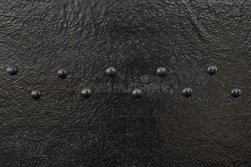Large Rivets on the Black Surface. Rivets on Black Metal Stock Photo ...
