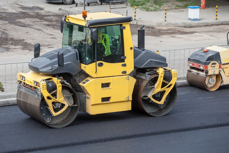 Paving Machine Crew at Road-works Stock Photo - Image of paver, works ...