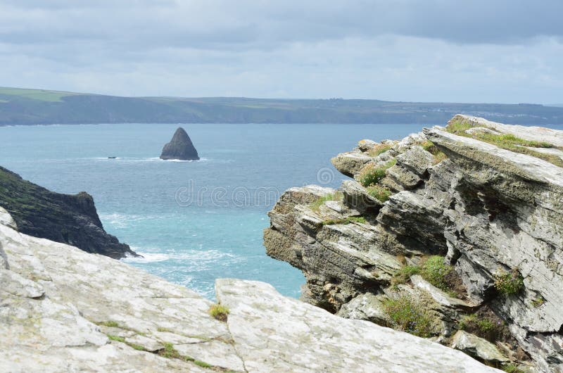 Large Rock with Coastline in Background Stock Photo - Image of scenic ...
