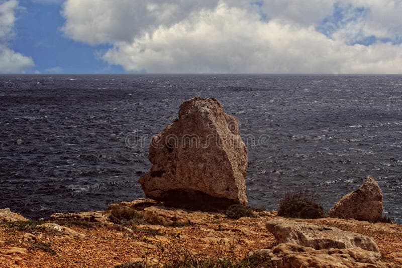 Large Rock at the Edge stock image. Image of horizon - 134600289