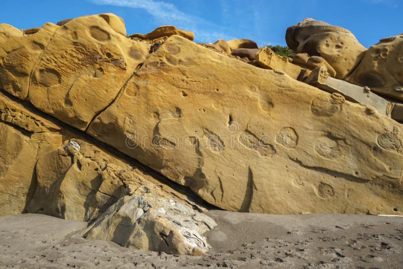 Large Rock Formation Coming Out of Sand Stock Photo - Image of ...