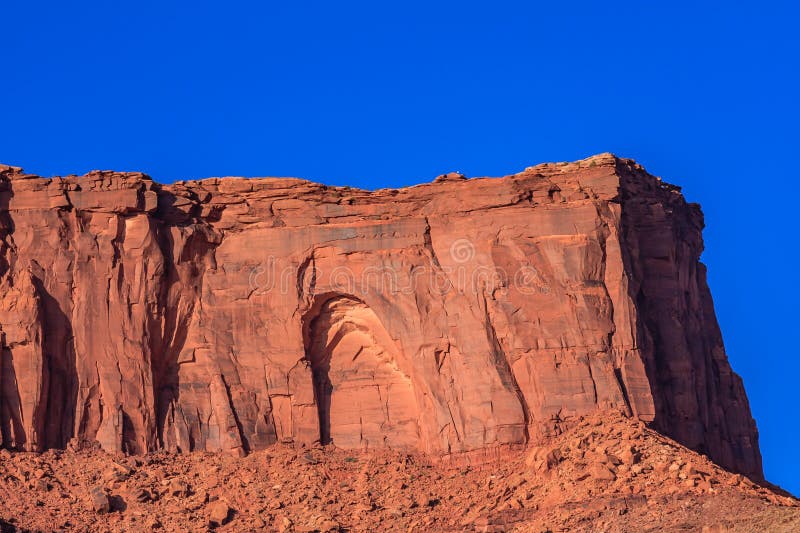 A Large Rock Formation with a Hole in the Middle Stock Image - Image of ...