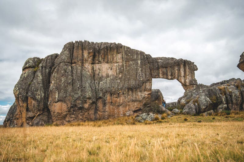 A Large Rock Formation with a Small Hole in the Middle, Traveling ...