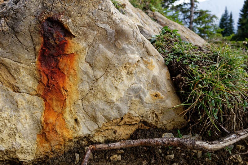 Large rock with rusty spot stock image. Image of landscape - 341854921