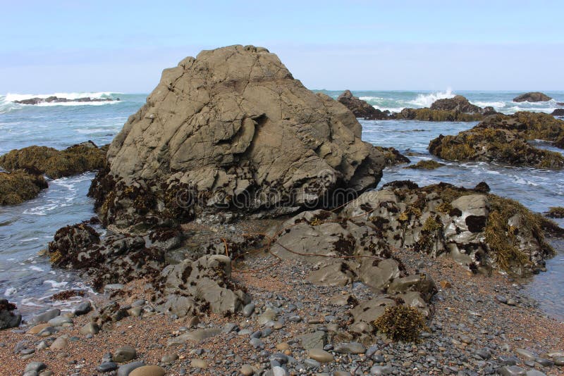 Large Rock on Rocky Coastline Stock Image - Image of driving ...