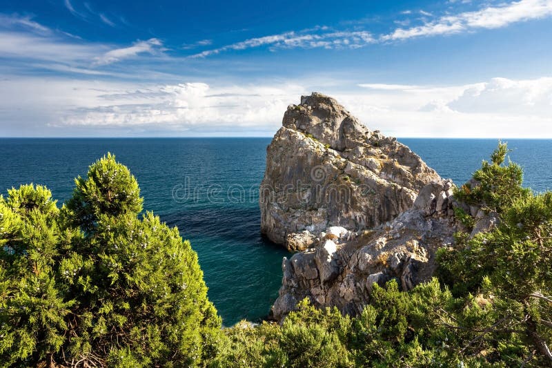 Large Rock Standing in the Sea Stock Photo - Image of landscape ...